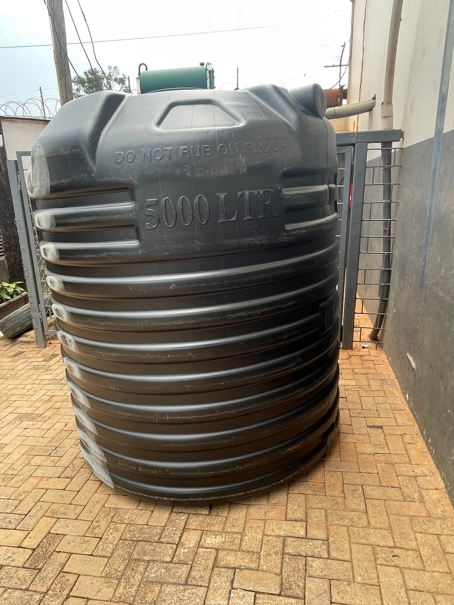 Pride Microfinance-Kasese donate tank to Kasindi Market vendors ...